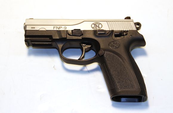 Bonhams : A boxed FN Herstal Model FNP-9 semi-automatic pistol