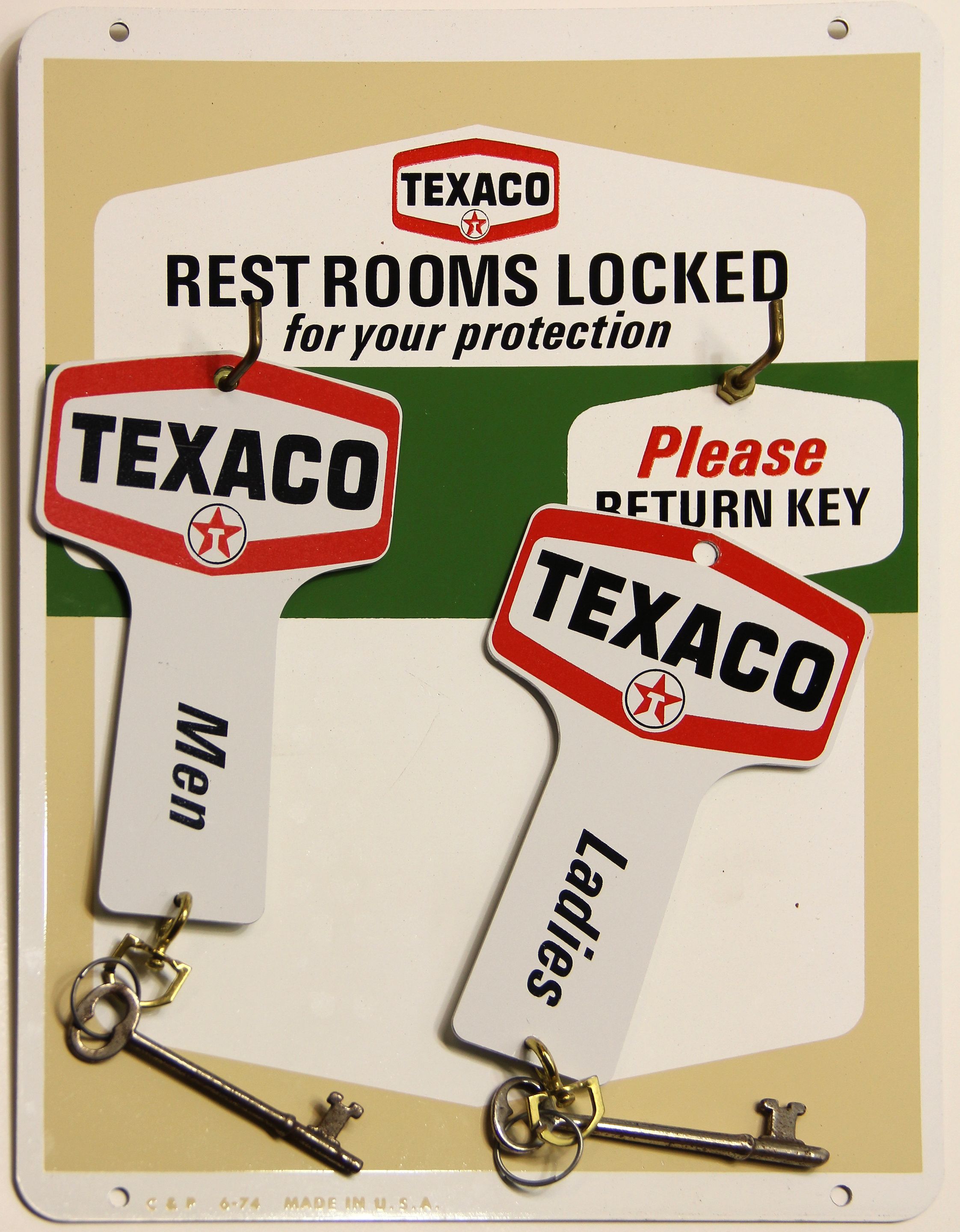 Bonhams Cars : An rare, original Texaco restroom door key sign, circa ...