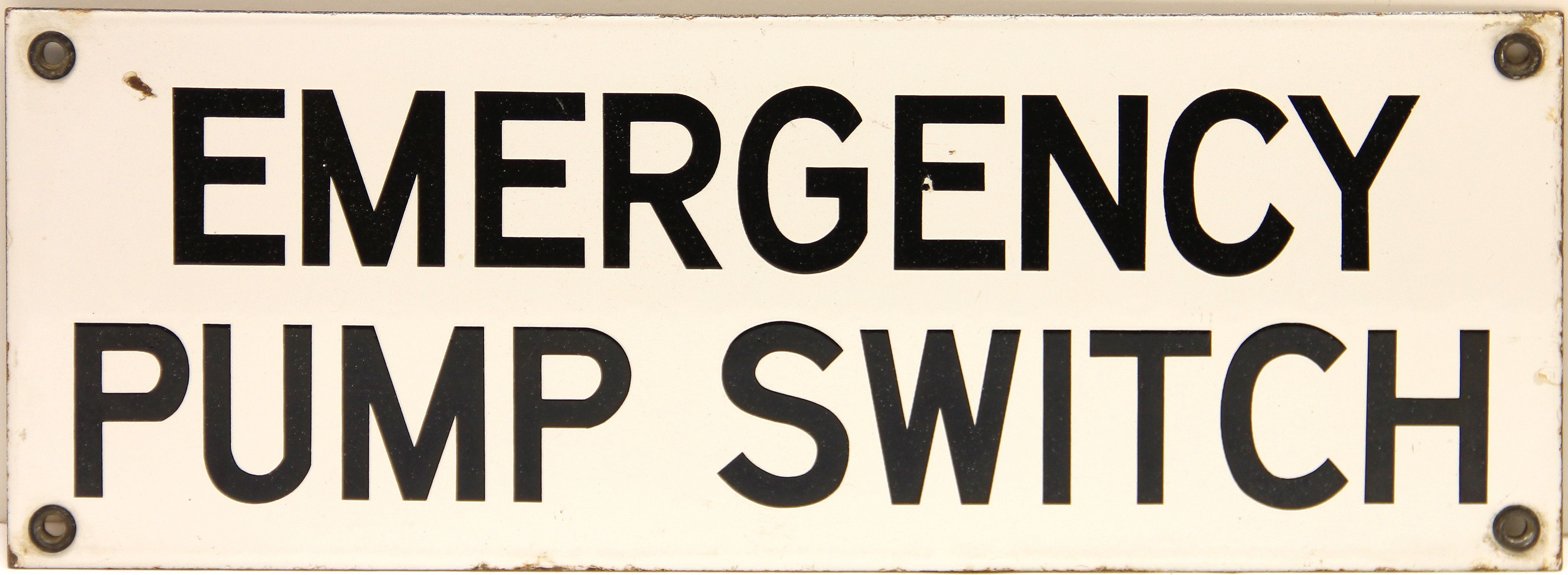Bonhams Cars : An 'Emergency Pump Switch' sign,