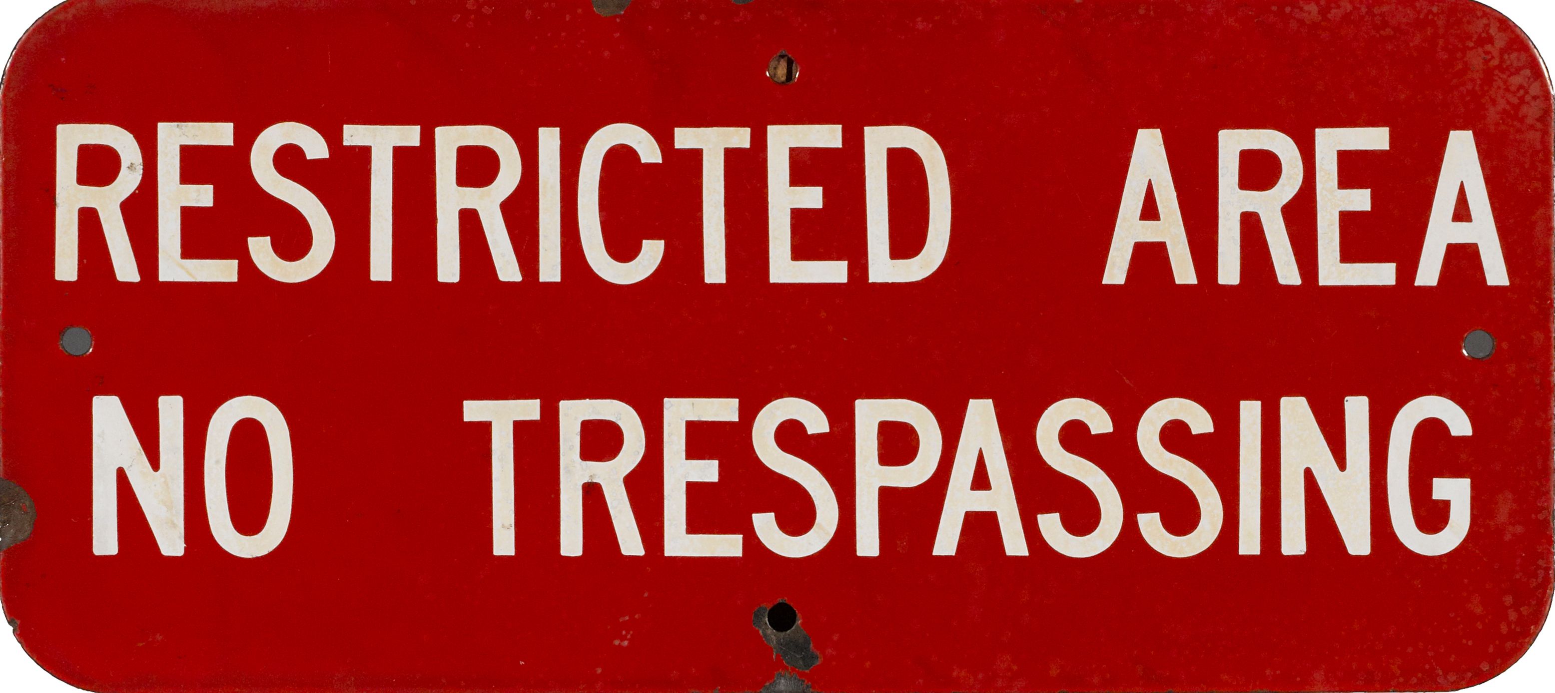Bonhams Cars : A "Restricted Area No Trespassing" sign,