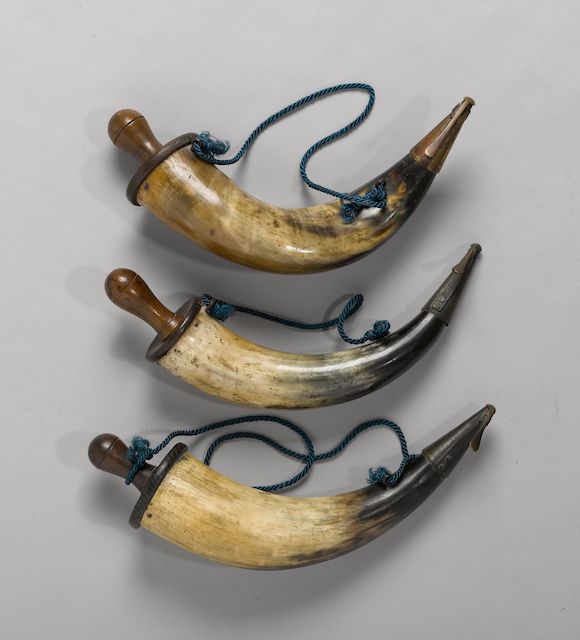 Bonhams : A lot of three military style powder horns
