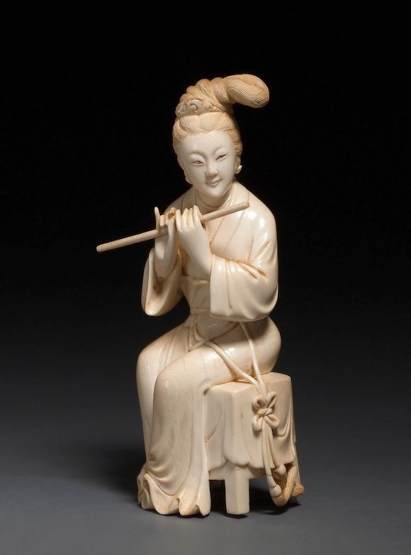 Bonhams : A tinted and carved ivory figure of a seated beauty Republic ...