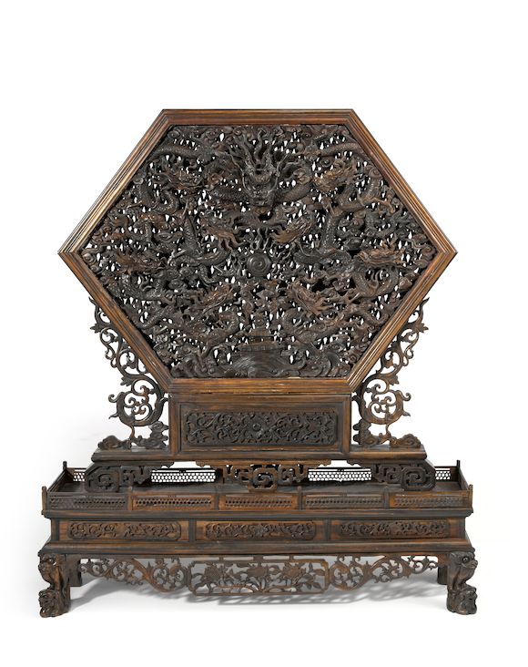 Bonhams : An unusual mixed wood table screen Republic period