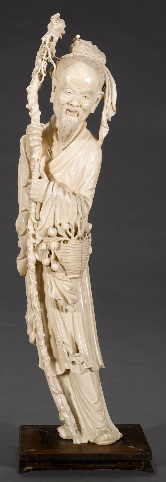 Bonhams : An ivory carved figure of an immortal 20th century