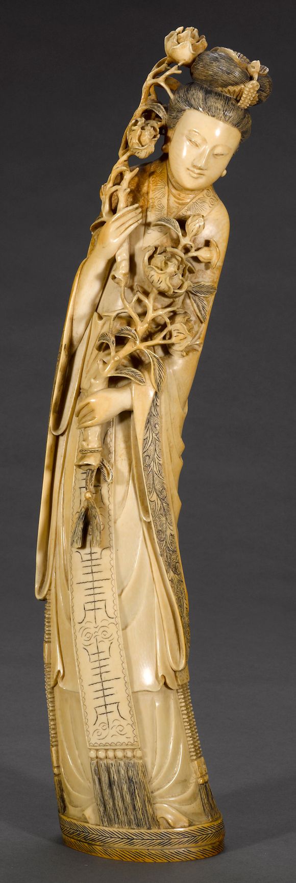 Bonhams : A large carved ivory figure of a female immortal 20th century