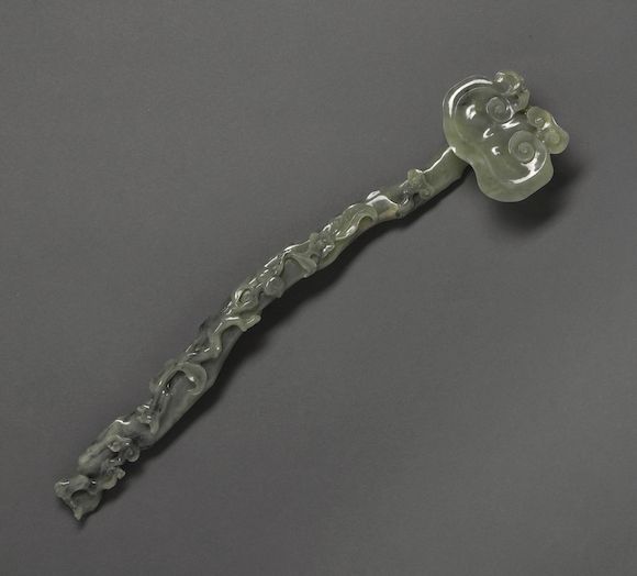 Bonhams : A pale green jade ruyi scepter