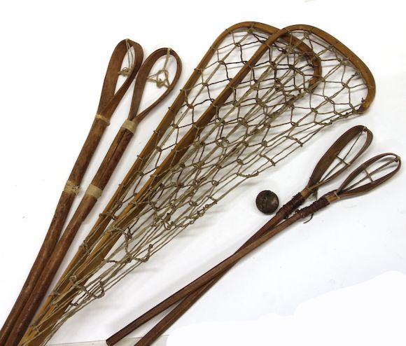 Bonhams : Three pairs of Native American lacrosse sticks
