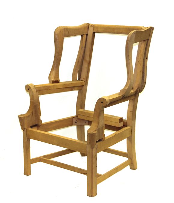Bonhams : Two wingback hardwood chair frames