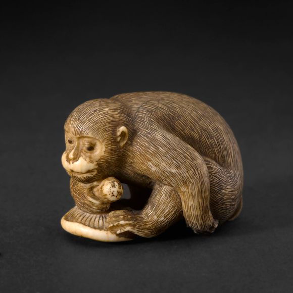 Bonhams : An ivory netsuke of a monkey 19th century