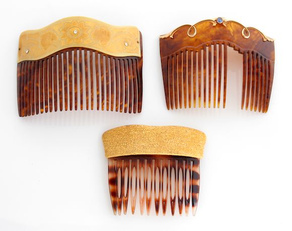 Bonhams : A collection of three 14k gold, metal, bakelite, and plastic ...