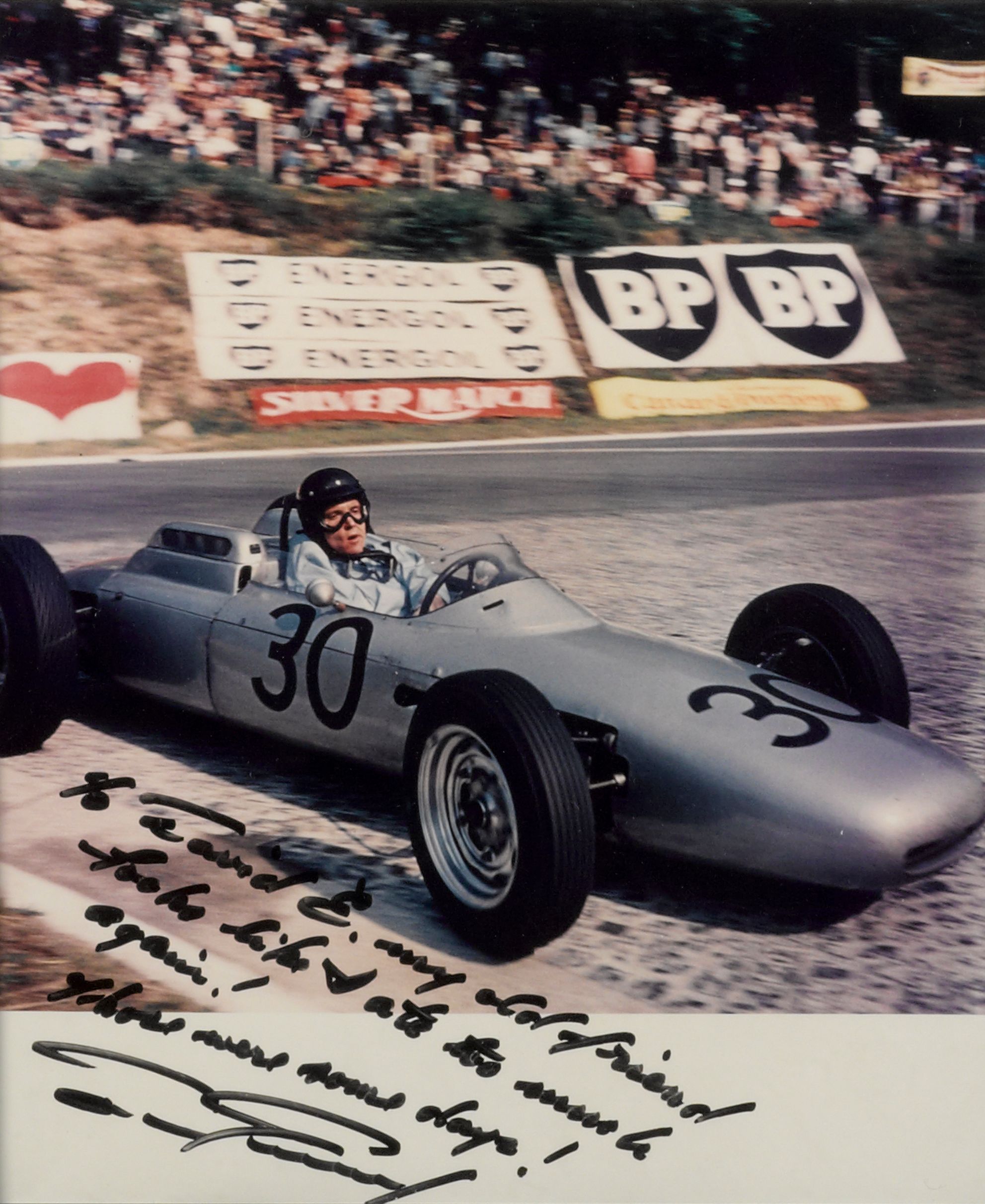 Bonhams Cars : A Dan Gurney signed photograph,