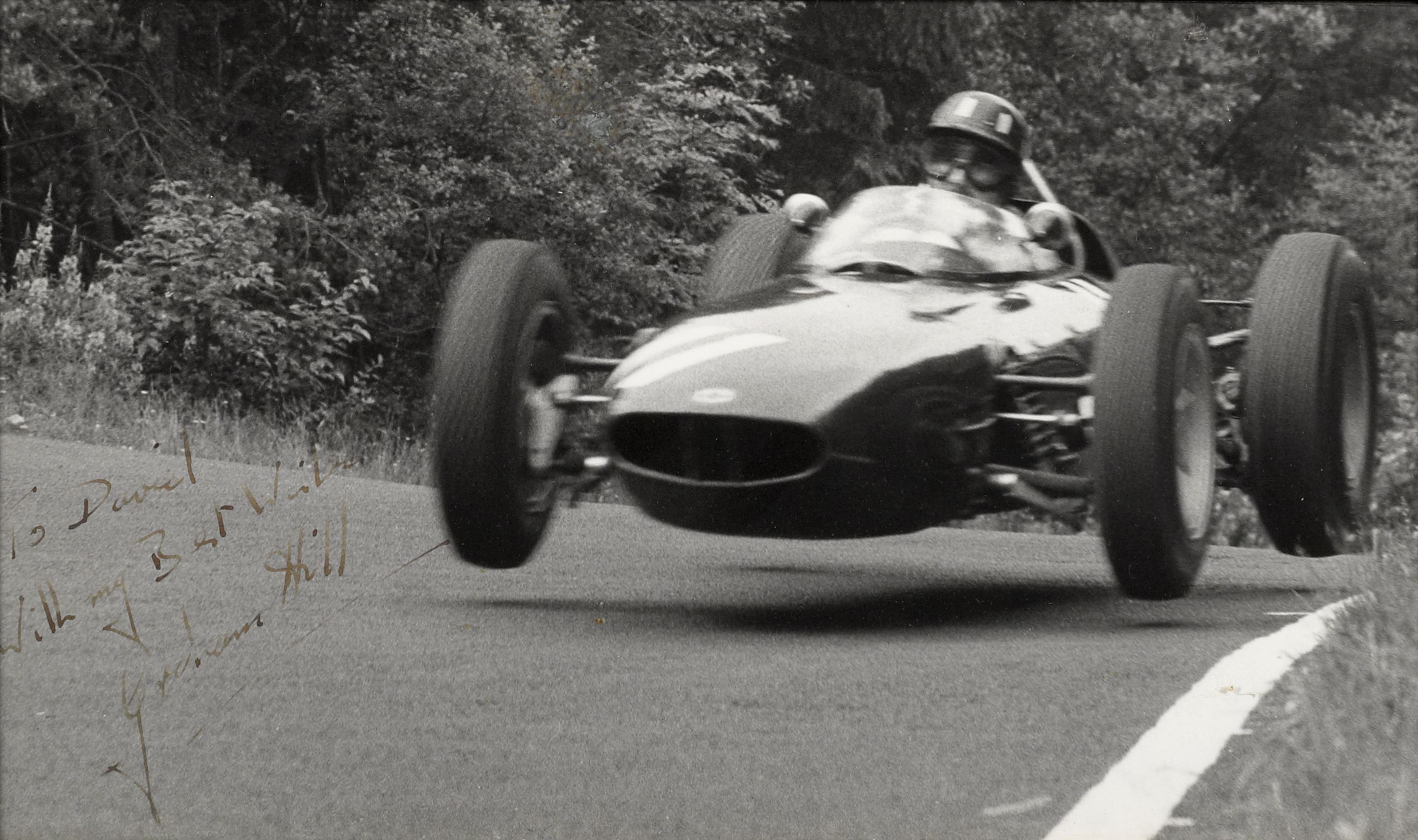 Bonhams Cars : A signed photograph of Graham Hill,