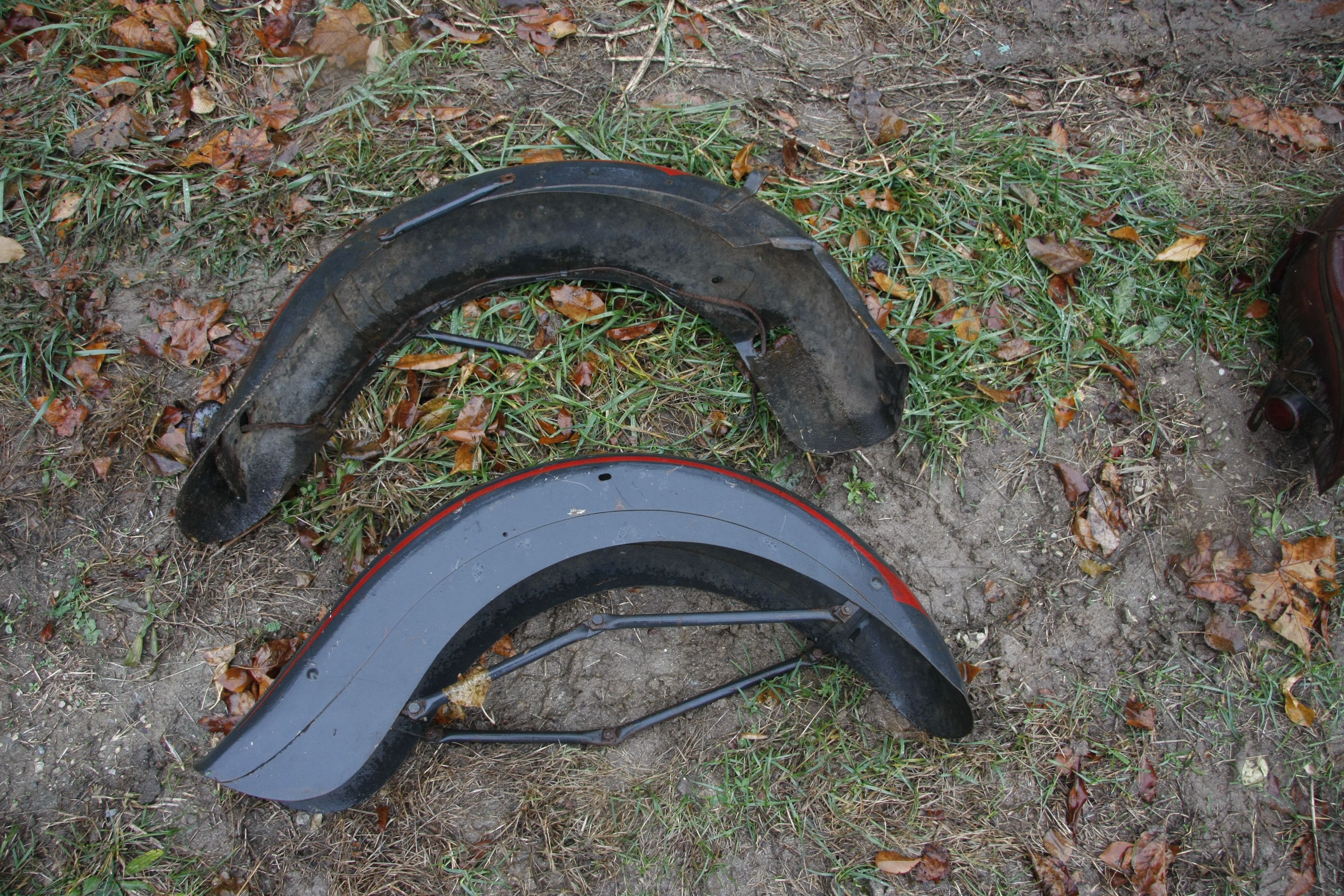 Bonhams Cars : A pair of helmet-type Scout fenders,