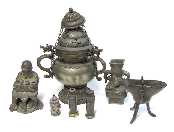 Bonhams : A group of Asian metal decorations