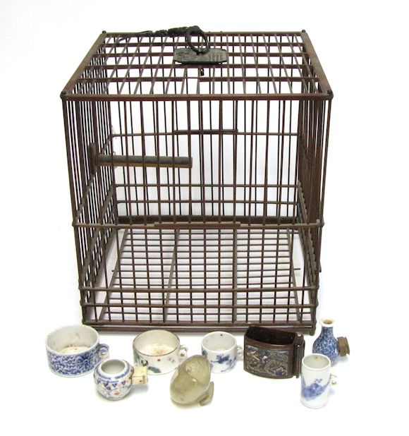 Bonhams : A Chinese wood and metal-mounted bird cage and assembled bird ...