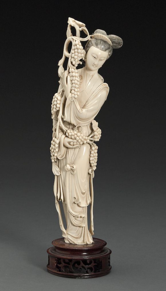 Bonhams : A carved ivory figure of a beauty 20th century