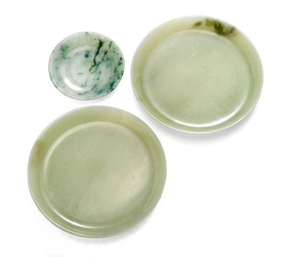 Bonhams : A pair of greenish-white jade shallow dishes