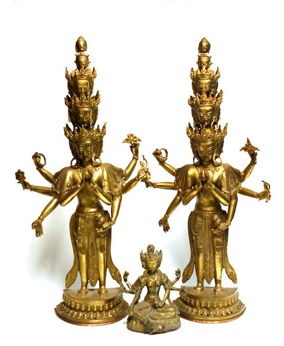 Bonhams : A group of three Himalayan cast metal Buddhist figures 20th ...