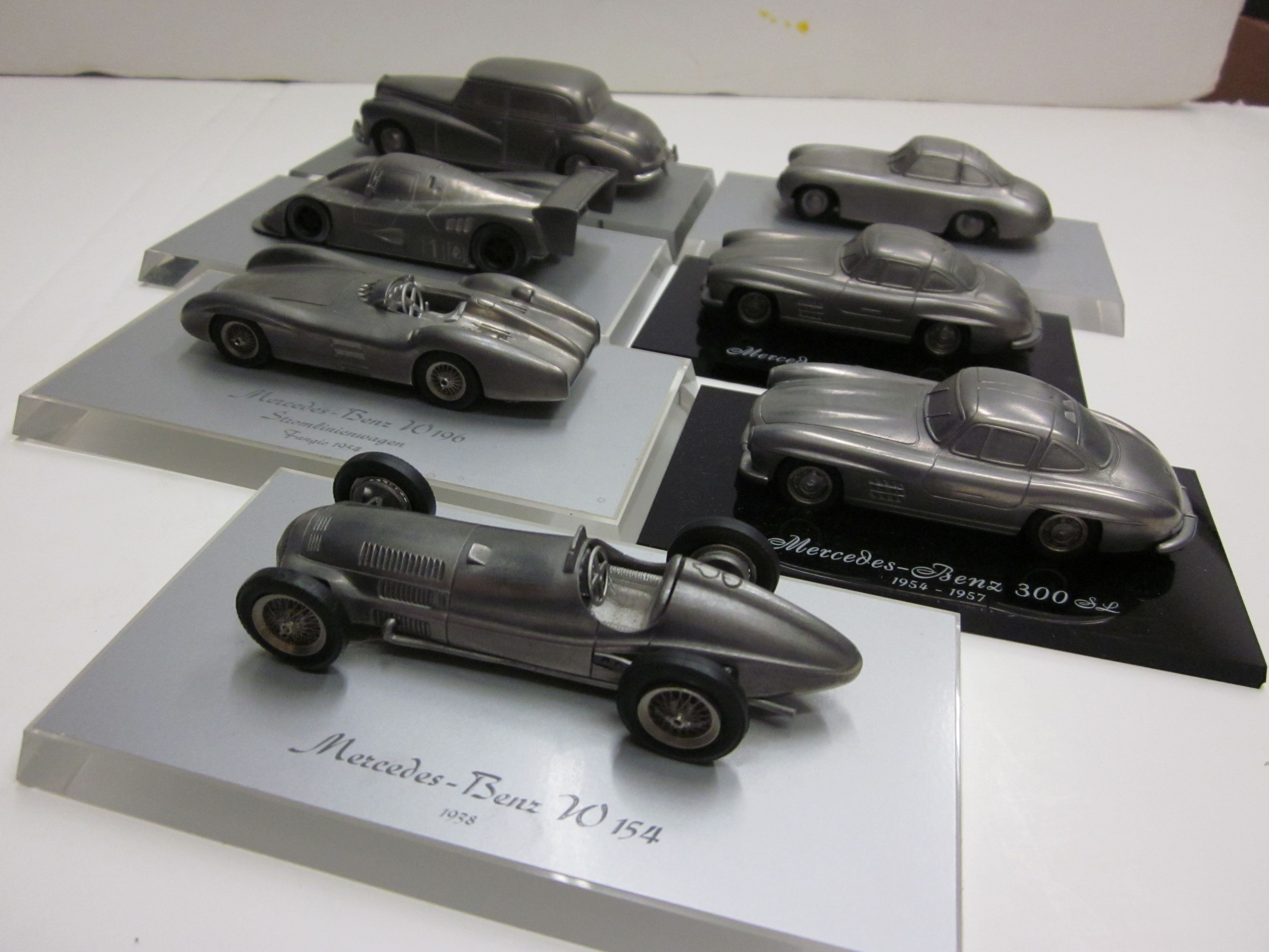 Bonhams Cars : A selection of limited edition pewter Mercedes model cars,