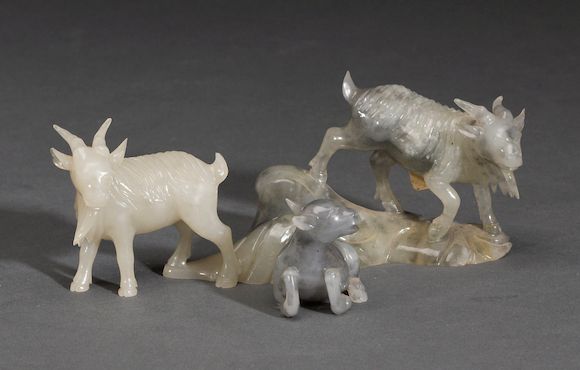 Bonhams : A Chinese carved jade group of three goats