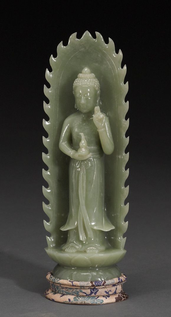 Bonhams : A nephrite figure of Buddha