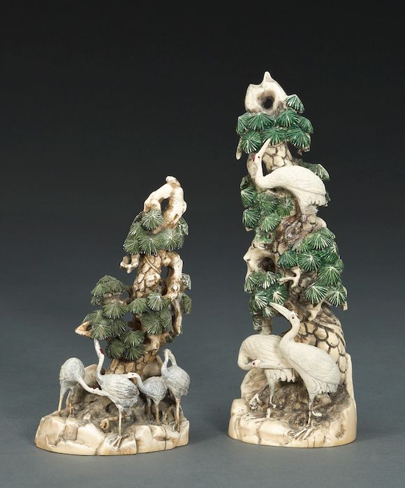 Bonhams : A pair of tinted ivory carvings of pines and cranes 20th century