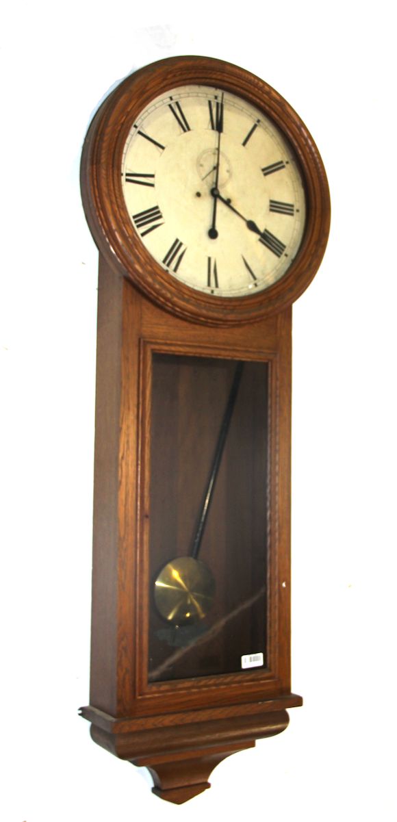 Bonhams : An Ansonia regulator wall clock in oak case late 19th century