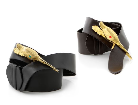 Bonhams : A collection of two gold metal and colored stone bird head ...