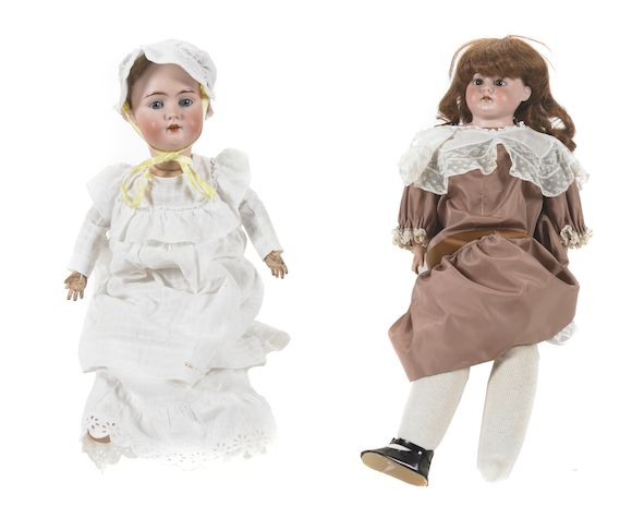 Bonhams : A group of two porcelain headed dolls