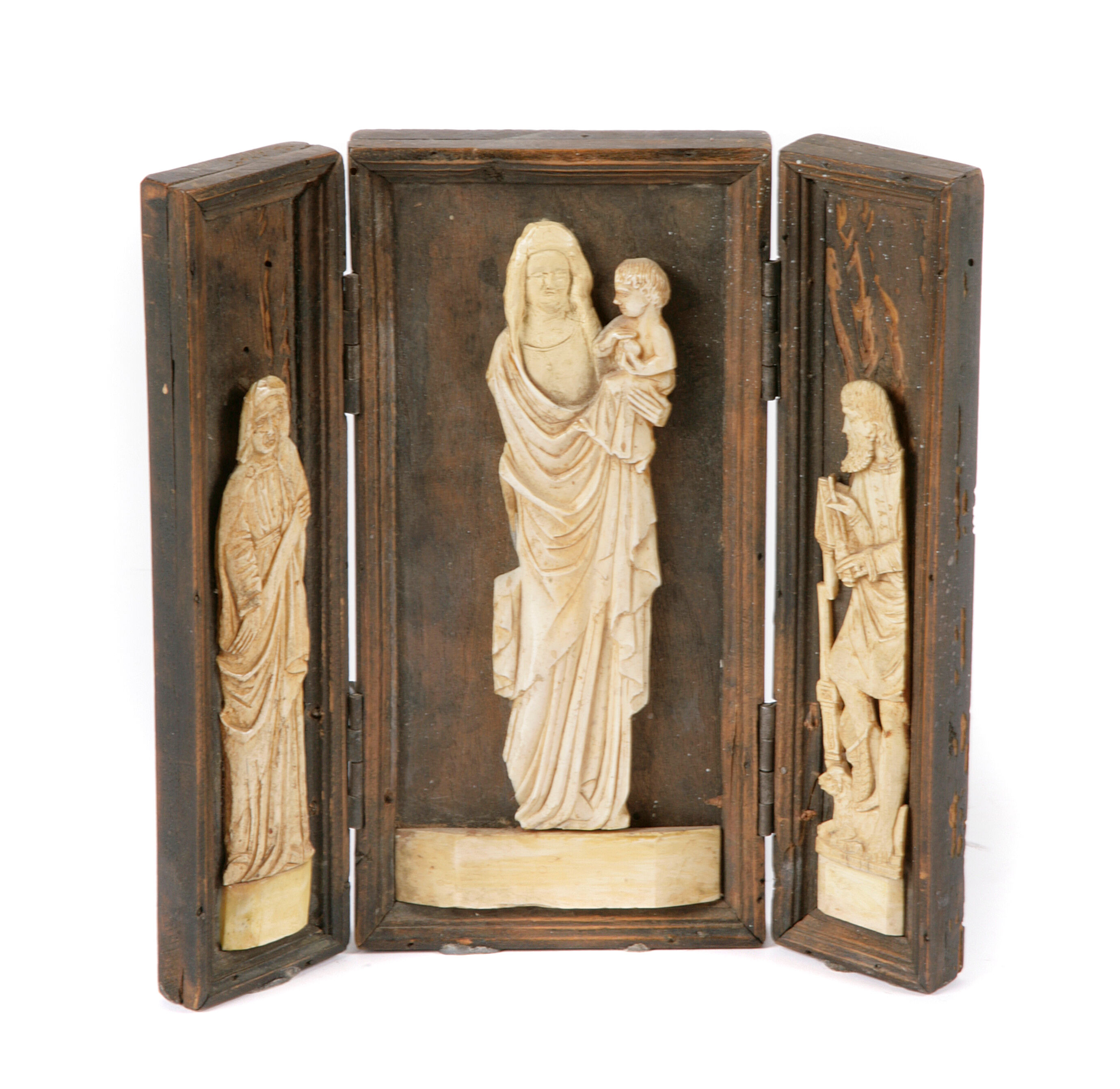 Bonhams : A Continental carved ivory and walnut triptych