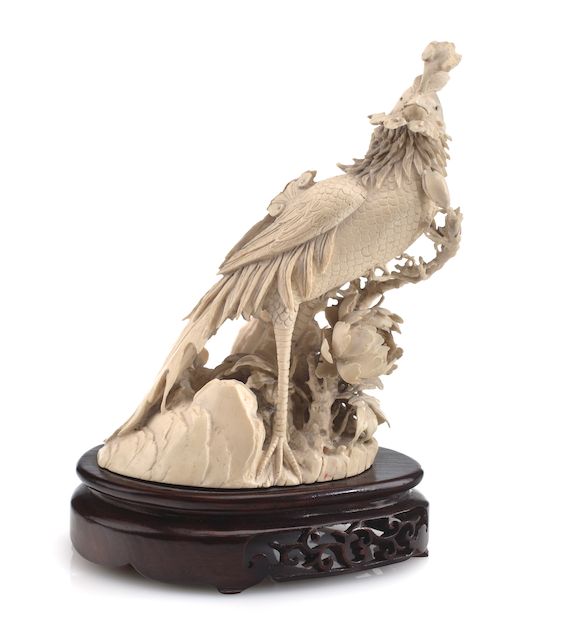 Bonhams : A carved ivory phoenix Mid-20th century