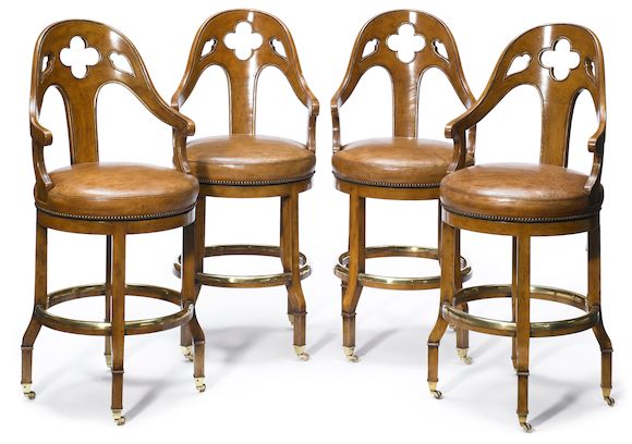 Bonhams : A set of four Gothic Revival mixed wood revolving bar stools