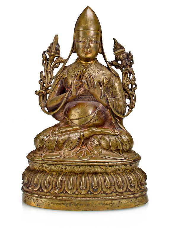 Bonhams : A gilt copper alloy figure of Tsong Khapa Tibet, 15th century