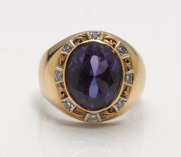 Bonhams : A synthetic color-change sapphire, diamond and 14k gold ring