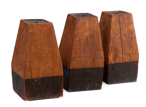 Bonhams : A group of three parcel ebonized oak dock pilings of squared ...