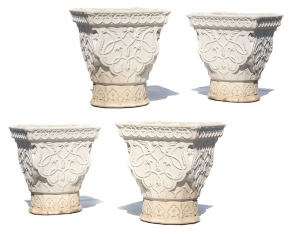 Bonhams : A set of four Haddonstone cast stone Zahra vase jardinières ...
