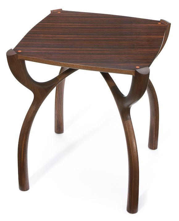 Bonhams : A Todd Ouwehand arched macassar ebony and walnut side table 2011