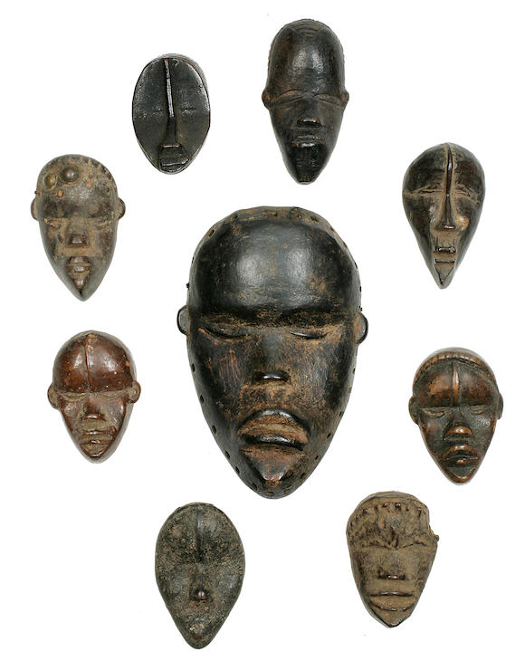 Bonhams Group Of Nine Dan Passport Masks Liberia