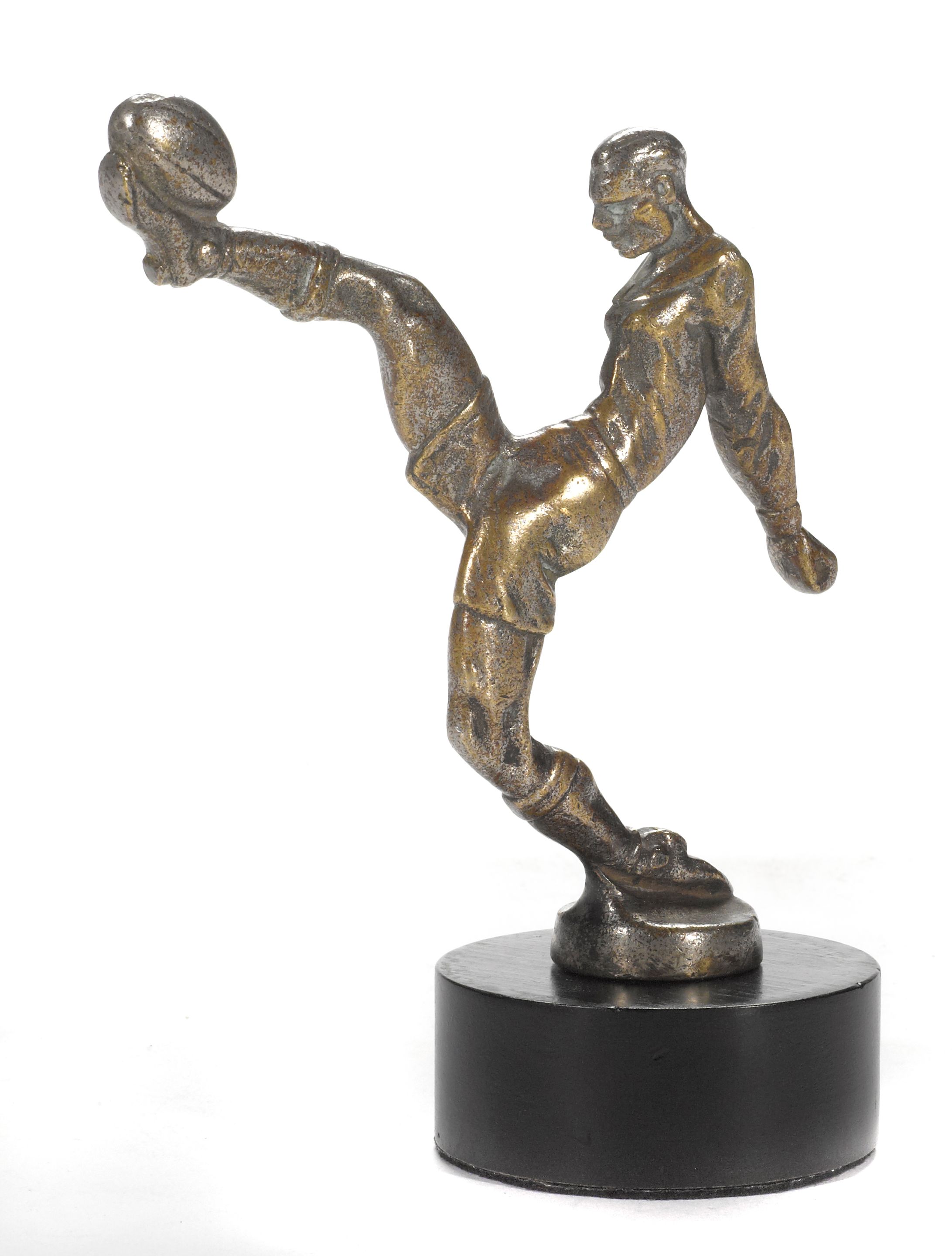 Bonhams Cars : A Rugby player mascot, c. 1925,