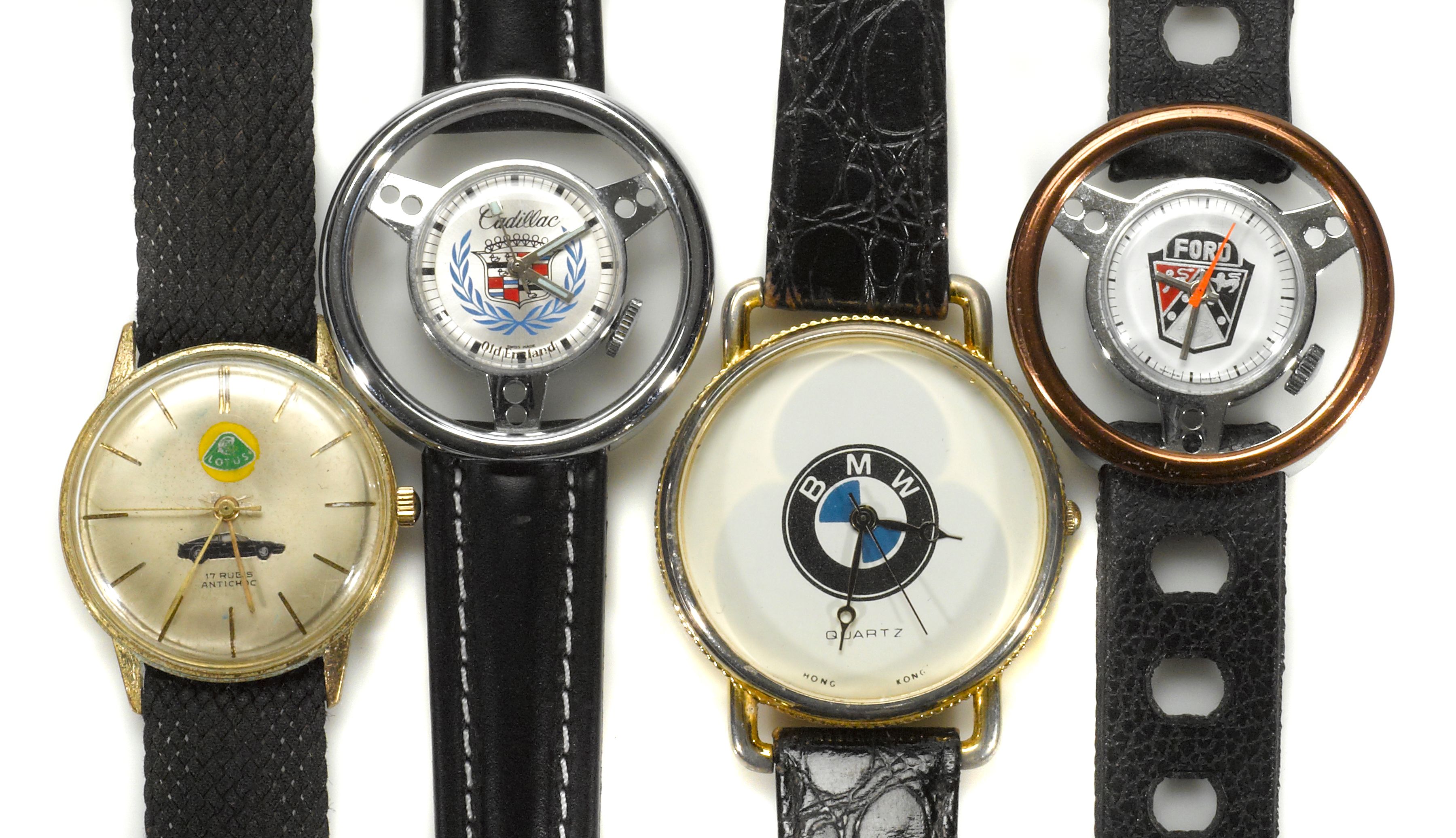 Bonhams Cars : A collection of 4 mens automobile watches of various ...