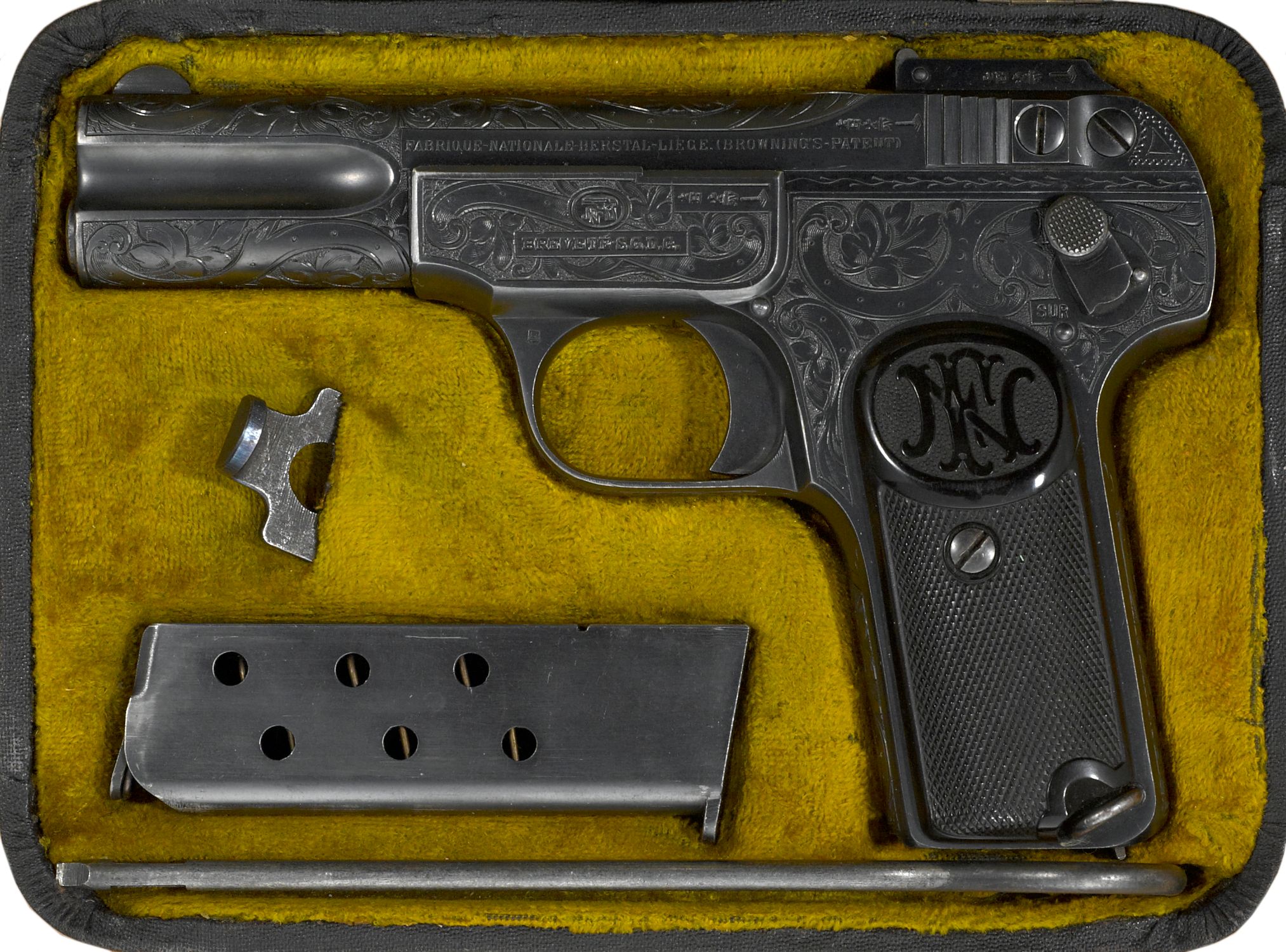 Bonhams : A scarce cased and factory engraved FN Model 1900 semi ...
