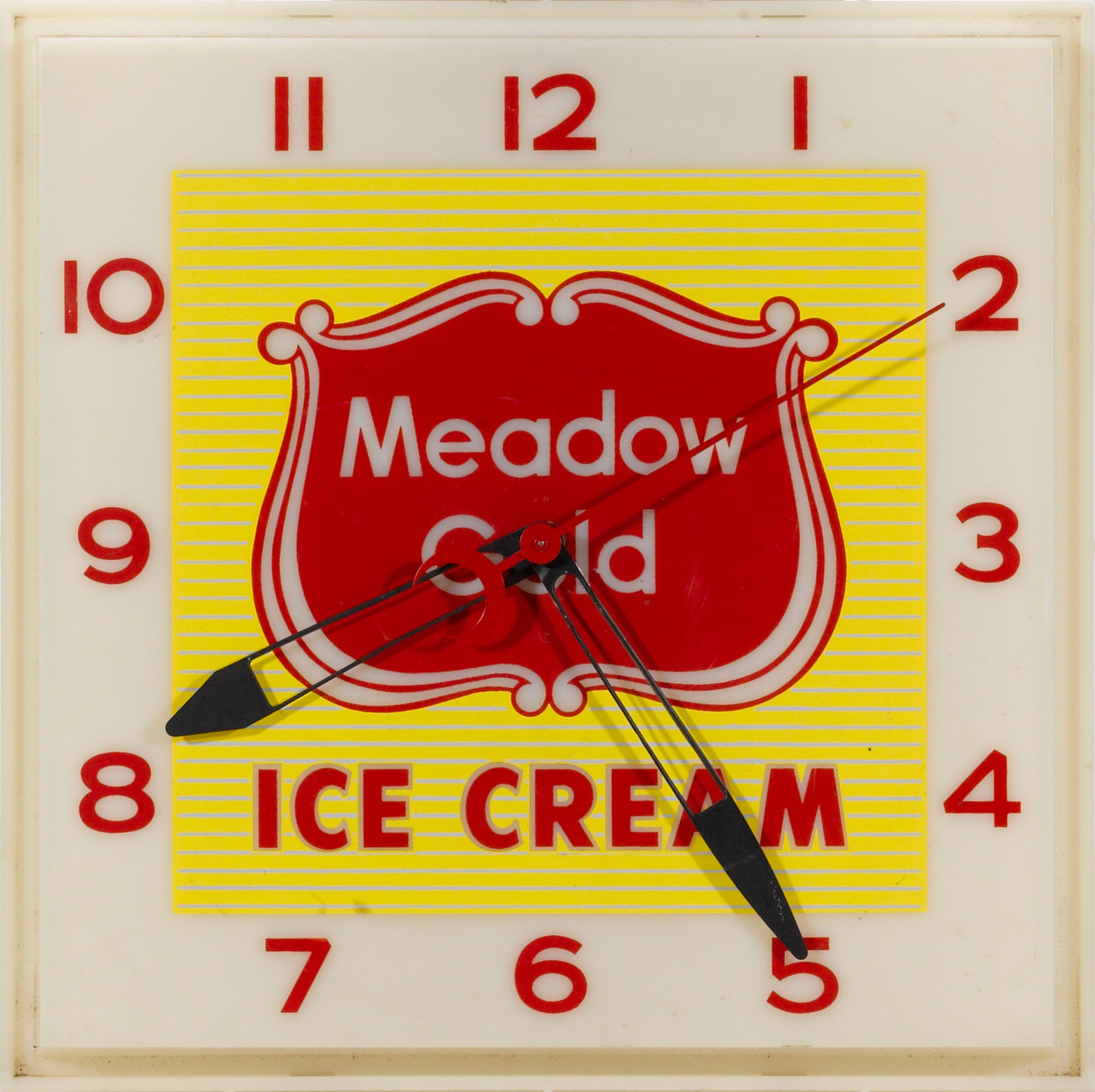 Bonhams Cars : A illuminated Medow Gold Ice Cream clock,