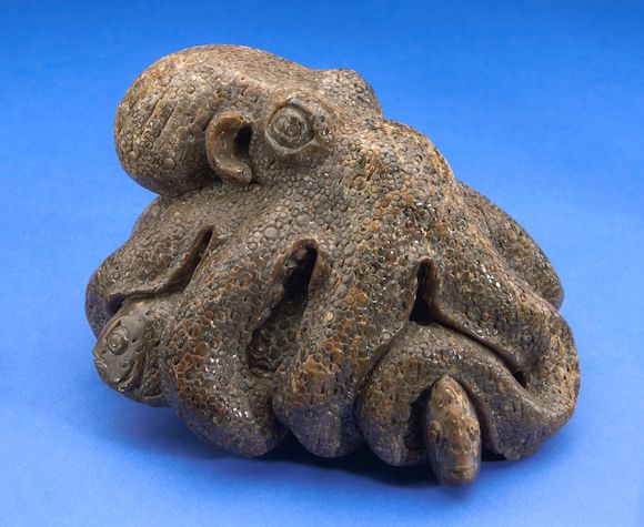 Bonhams : Fossil Coconut Carving of an Octopus