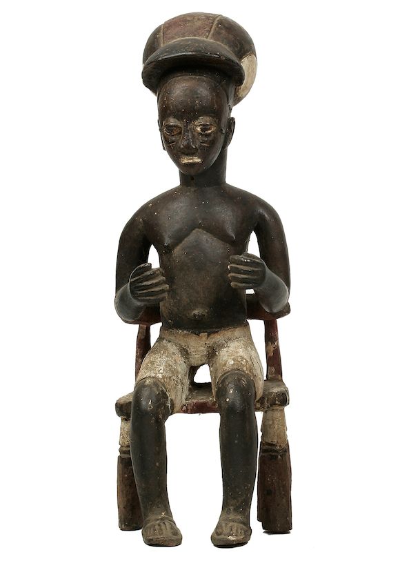 Bonhams : Baule Seated Colonial Male Figure, Ivory Coast