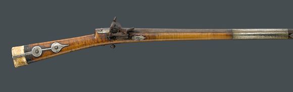 Bonhams : A silver-mounted North Persian miquelet rifle