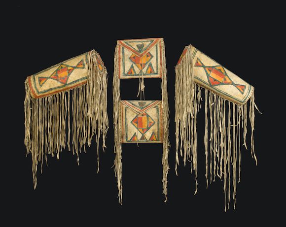 Bonhams : A set of four Plains parfleche cases