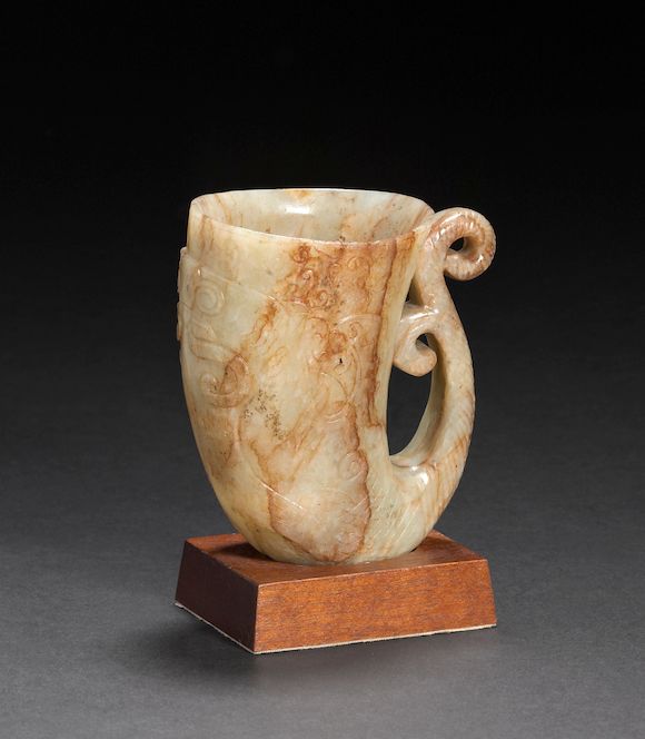 Bonhams : A mottled jade archaistic rhyton cup 17th/18th century