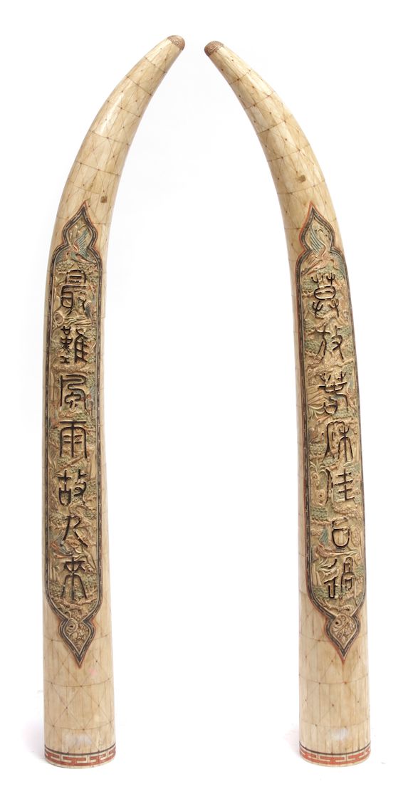 Bonhams : A pair of Chinese bone veneered tusk-form elements