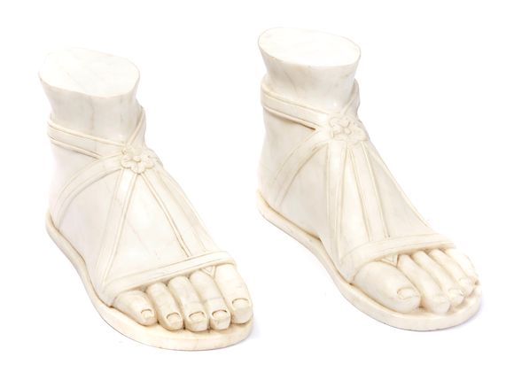 Bonhams : A pair of Classical style carved marble feet