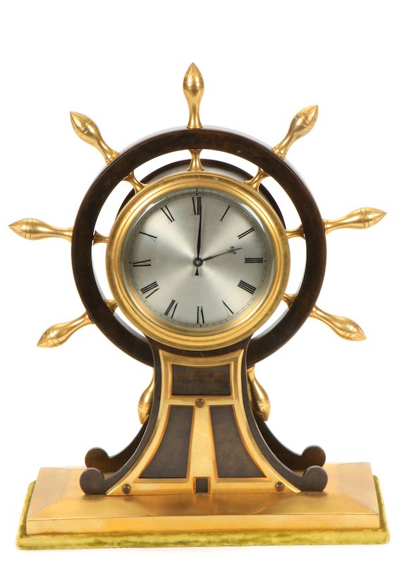 Bonhams : A patinated bronze and gilt brass ship's wheel mantel clock